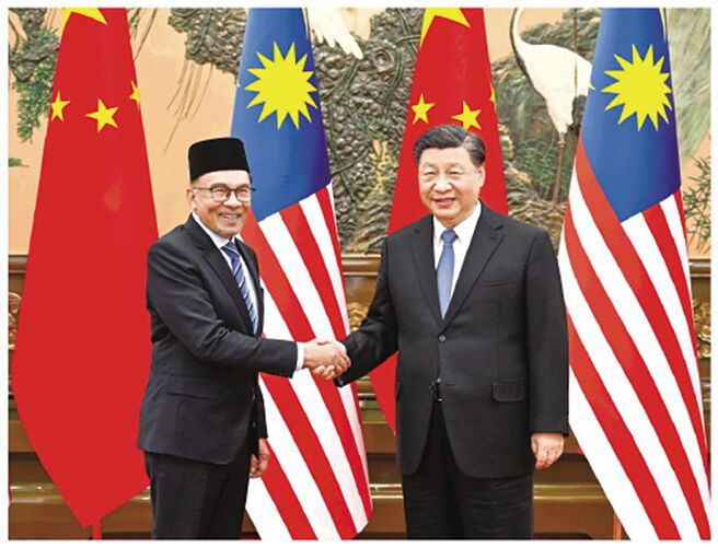 安华访中行 取得1700亿令吉投资额 - 国际新闻 - 旺报